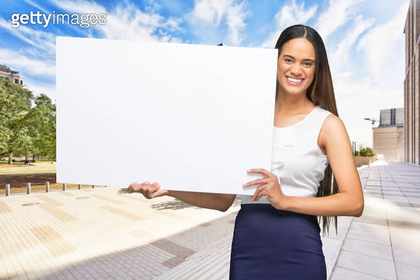 Waist up / portrait / front view / looking at camera / one person of beautiful african ethnicity ...