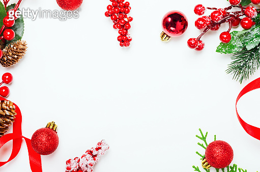 Holly ilex twigs and pinecones top view background. Decorative ...