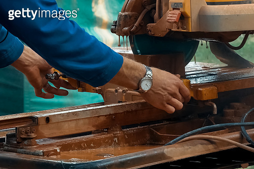 Measuring and marking bricks during the construction of house ... Measuring and marking bricks during the construction of house ...