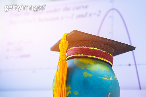 Education Graduate study international concept: Graduation cap on top ...