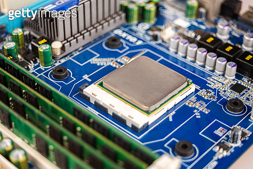 computer CPU close-up on the motherboard background, socket of central process unit, connection ...