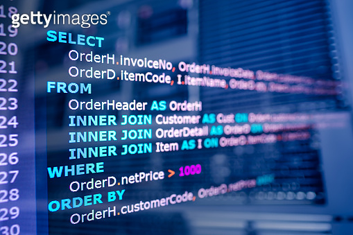 Sql Structured Query Language Code On Computer Monitor And Server
