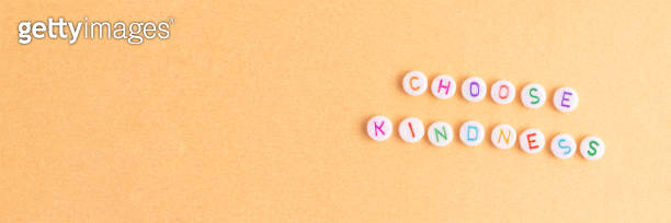 Choose kindness. Banner with quote made of beads with letters ...