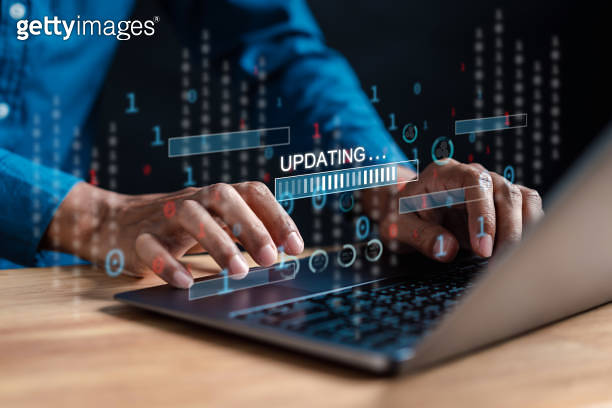 Update software system in computer. Man using smartphone upgrade program, Business technology ...