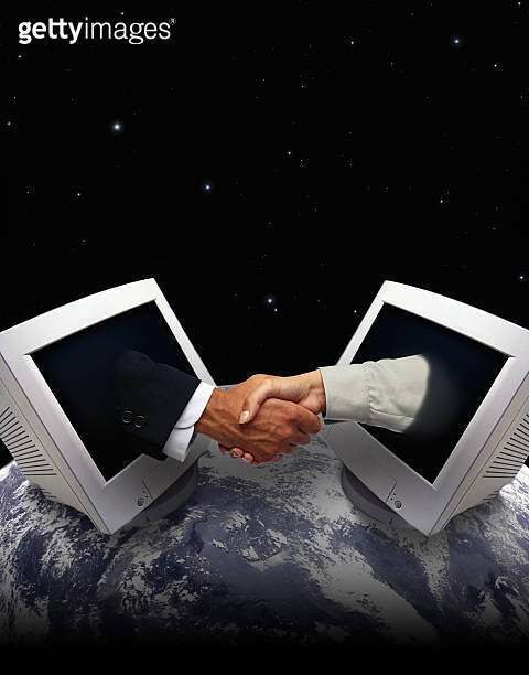 Computer Monitor Handshake (BU010724) - 게티이미지뱅크