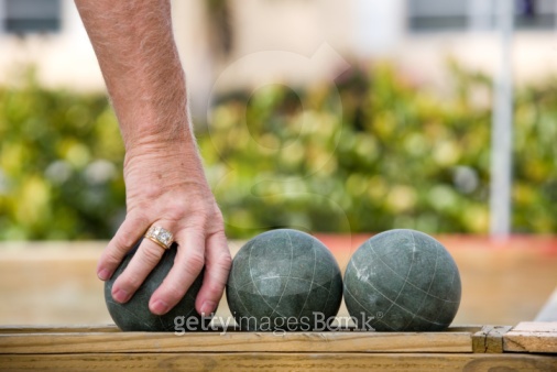 Hand reaching for bocce ball (89694348) - 게티이미지뱅크