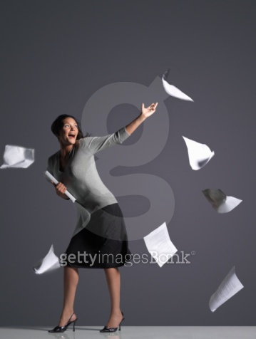 Young Businesswoman with Scattering Papers, side view 이미지 (103578687 ...