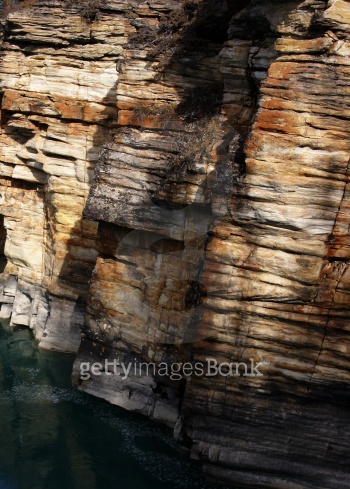Colorful eroded limestone cliff layers 이미지 (144879998) - 게티이미지뱅크