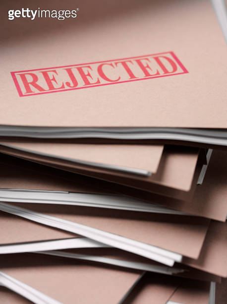 Pile of Paperwork with a Rejected Stamp (182216669) - 게티이미지뱅크