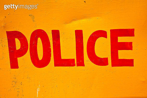 Dented Street Sign, India: POLICE, yellow with red Letters 이미지 ...