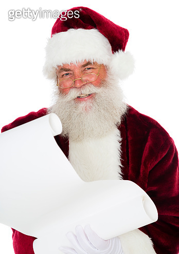 Santa Claus Checking His List (174284691) - 게티이미지뱅크