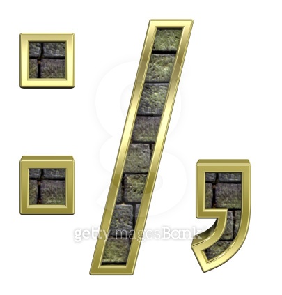 Colon, semicolon, period, comma from stone with gold frame alphabet ...