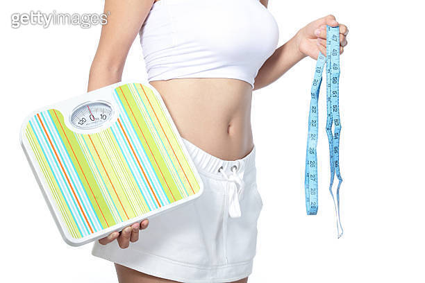 girl holding weighing scales and measuring ruler with perfect body 이미지 ...
