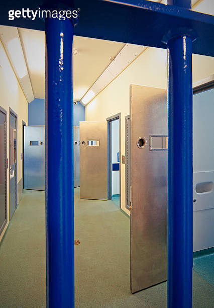 Inside of a modern prison with open doors (174903079) - 게티이미지뱅크
