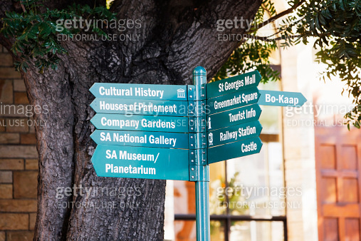 Multiple direction signs point out tourist sites in Cape town 이미지 ...
