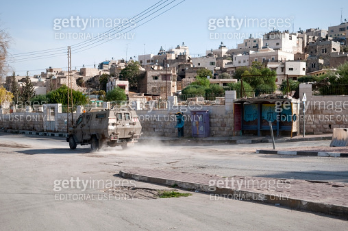 Israeli military vehicle on Shuhada Street in Hebron 이미지 (458996391 ...