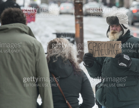 Asking for Spare Change (459013779) - 게티이미지뱅크