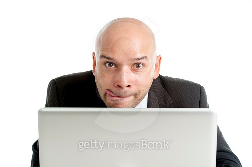 businessman typing on computer keyboard with funny face expression 이미지 ...