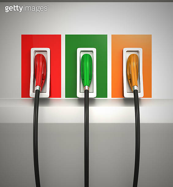 Front view of three gas pump nozzles (470448597) - 게티이미지뱅크