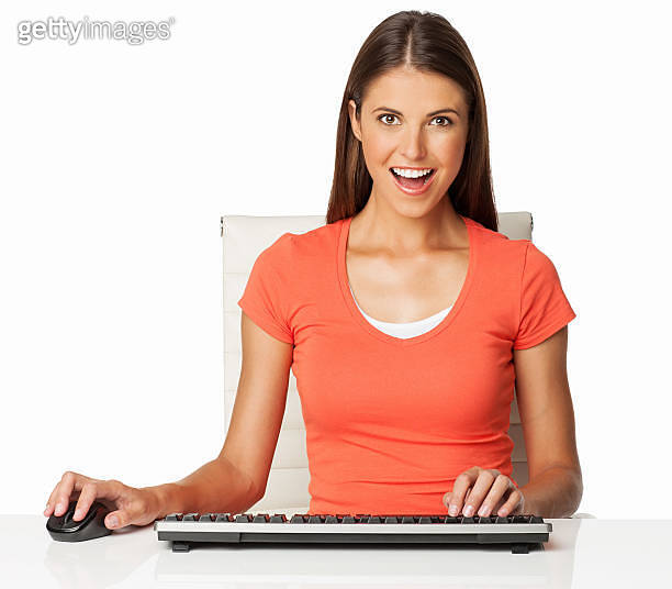 Surprised Woman Using Computer Keyboard And Mouse - Isolated 이미지 ...