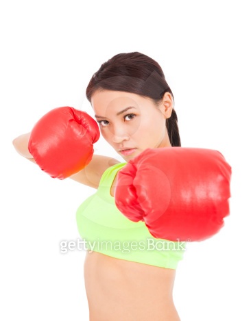 pretty Female boxer ready a fighting pose 이미지 (490377137) - 게티이미지뱅크