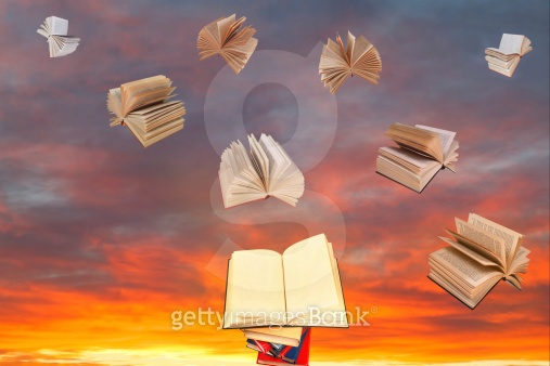 book above of stack and sunset sky 이미지 (467506597) - 게티이미지뱅크