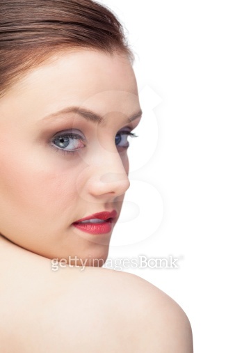 Relaxed young model looking over shoulder 이미지 (494348293) - 게티이미지뱅크