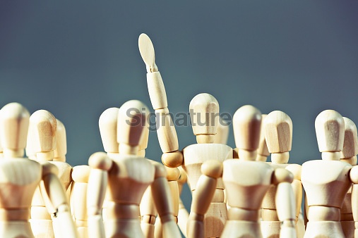 Enthusiastic puppet in crowd raises hand 이미지 (518656551) - 게티이미지뱅크