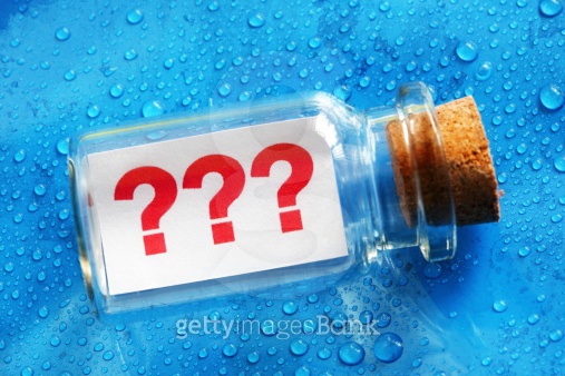 Question mark message in a bottle (501735789) - 게티이미지뱅크