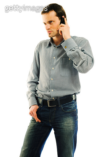 Young handsome man speaking over cell phone 이미지 (471179459) - 게티이미지뱅크