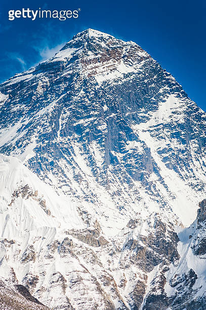 Mt Everest iconic pyramid summit towering over Himalaya mountains Nepal ...