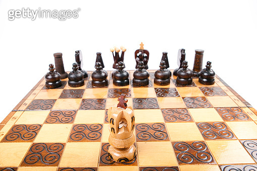 Lonely King fighting against enemies, Chess game, (530906341) - 게티이미지뱅크