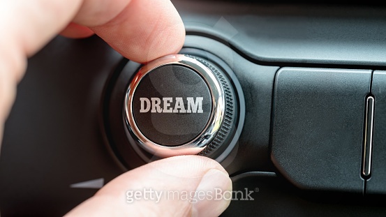 Man turning on a dream button 이미지 (477057034) - 게티이미지뱅크