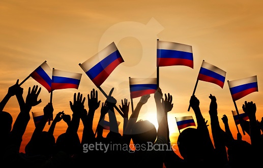 Group of People Waving Russian Flags in Back Lit 이미지 (467553150) - 게티이미지뱅크
