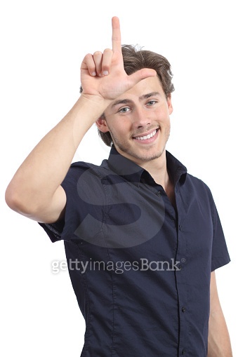 Man making loser gesture with his hand 이미지 (488612434) - 게티이미지뱅크