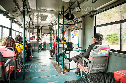 Public bus with passengers 이미지 (470739742) - 게티이미지뱅크