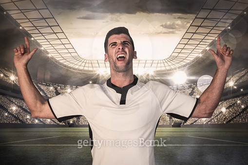 Composite image of excited rugby player pointing up 이미지 (490671690 ...