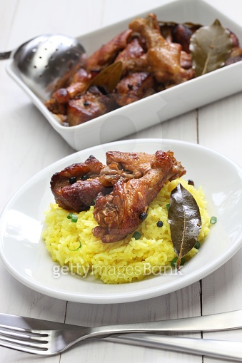 chicken and pork adobo over yellow rice, filipino food 이미지 (480111764 ...