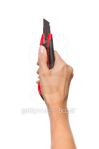 Hand Holding Cutter 이미지 (480010392) - 게티이미지뱅크
