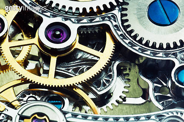 Intricate clockwork mechanism of skeleton watch seen in close up 이미지 ...