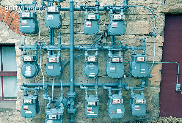 Gas meters attached to stone of 19th century building 이미지 (486903280 ...