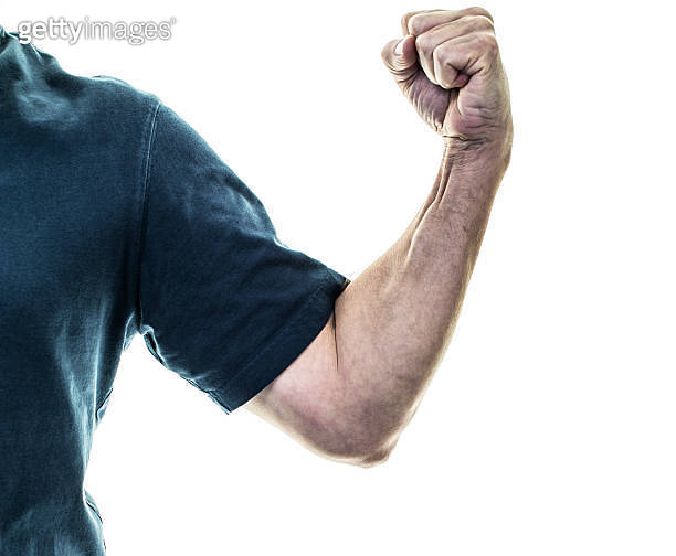 Senior Adult Man Flexing Strong Arm Muscles With Clenched Fist ...