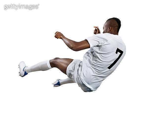 Isolated professional football player in action (501616507) - 게티이미지뱅크