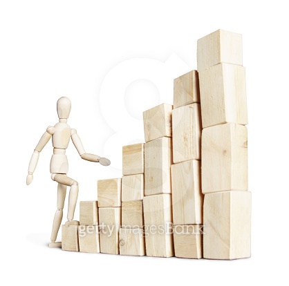 Man climbing to high stack of blocks 이미지 (506018678) - 게티이미지뱅크