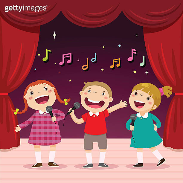 Children sing with a microphone on the stage 이미지 (514382756) - 게티이미지뱅크