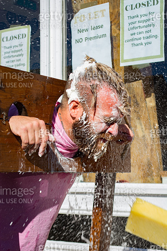 Wet Man in Wooden Stocks 이미지 (603191868) - 게티이미지뱅크