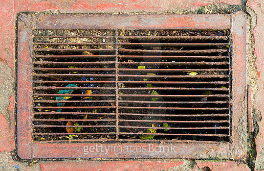 Metal Rustic dirty street water drain full with gabbage 이미지 (609828652 ...