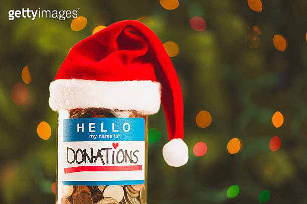 Donation money jar with Santa hat for Christmas charities (626124176 ...