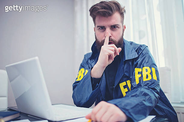 FBI agent in office 이미지 (545988784) - 게티이미지뱅크
