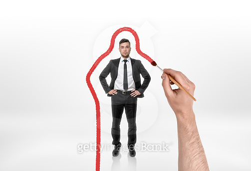 Hand tracing businessman with red line. (615510518) - 게티이미지뱅크